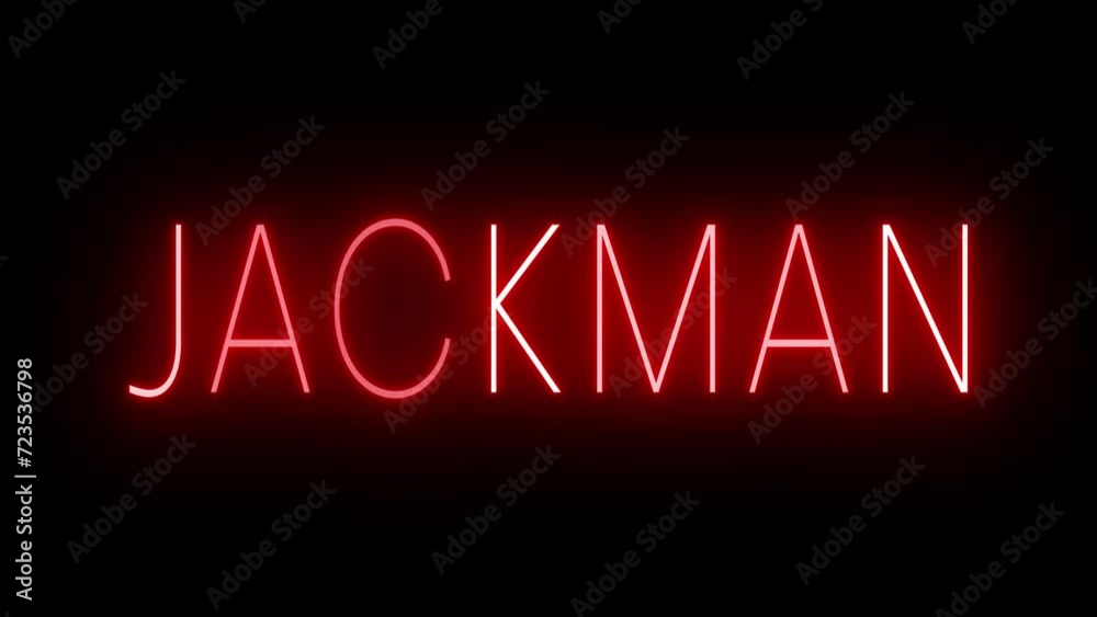 Flickering red retro style neon sign glowing against a black background ...