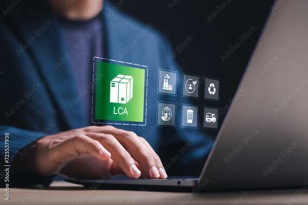 Foto de LCA or Life cycle assessment. Person use laptop with virtual ...