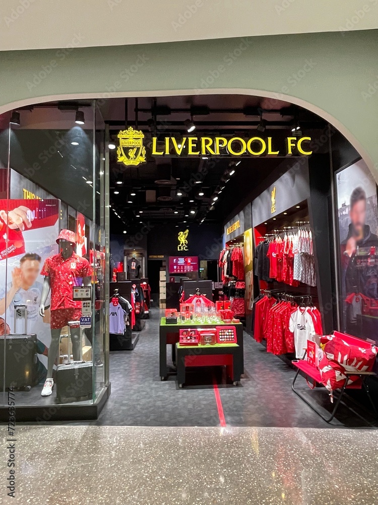 Liverpool FC Store in shopping mall. LFC Retail business. Bright yellow ...
