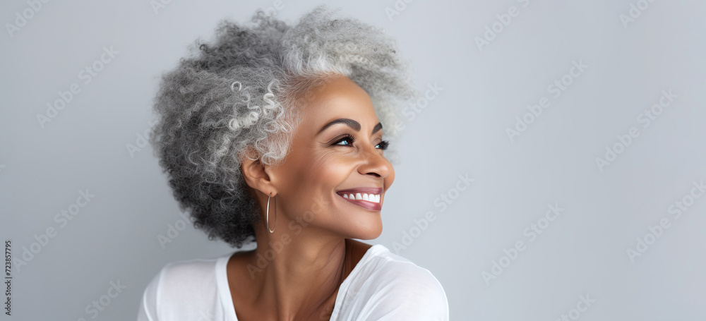 Dark skin woman with smooth healthy face skin. Beautiful aging mature ...
