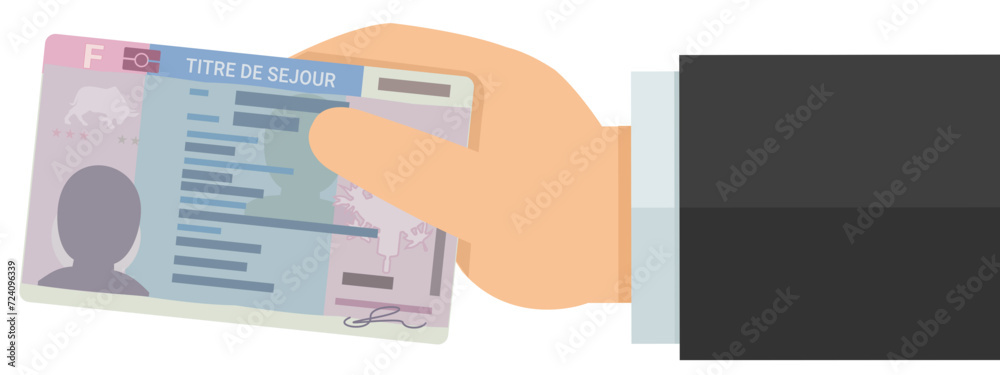 a hand presents a residence permit card of france ("Residence permit ...