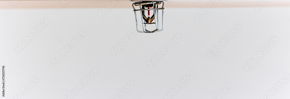 Fire sprinkler installed on the ceiling. Fire protection installations ...