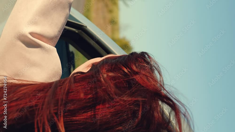 girl rides car with her hand out window, car countryside, outdoors ...