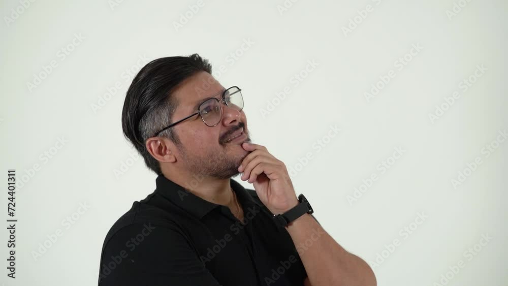 A creative man thinking, visualizing new ideas and concepts. A middle ...