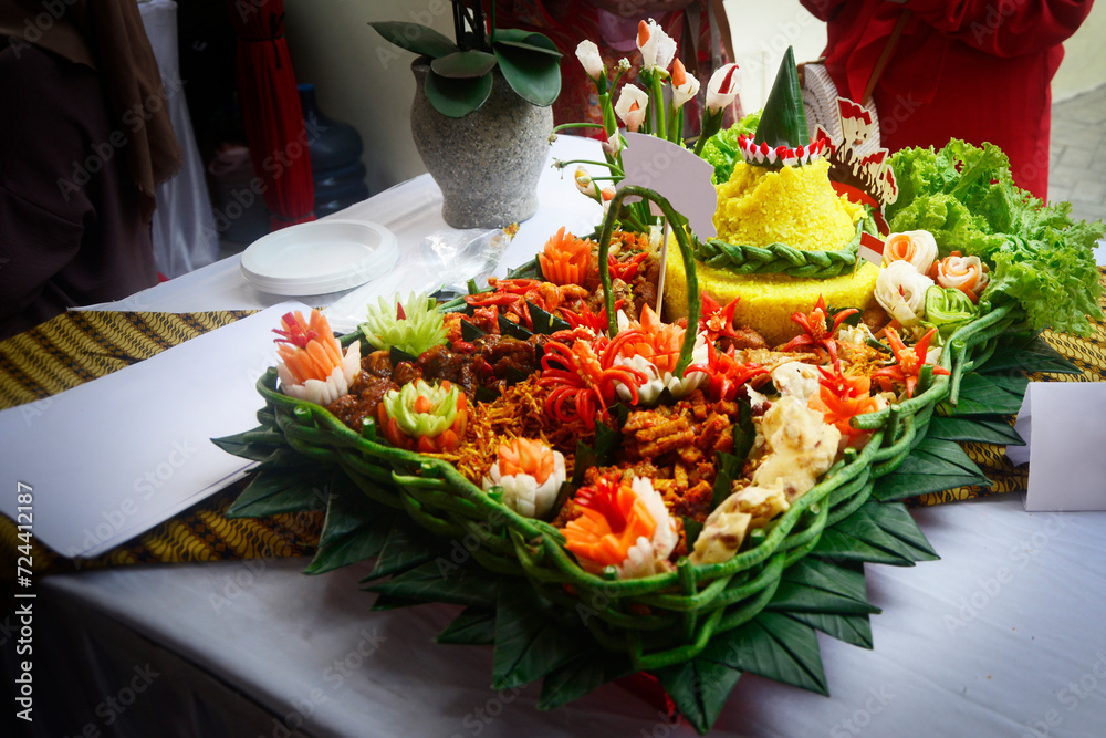 Tumpeng or tumpeng rice is a dish served at Javanese, Balinese ...
