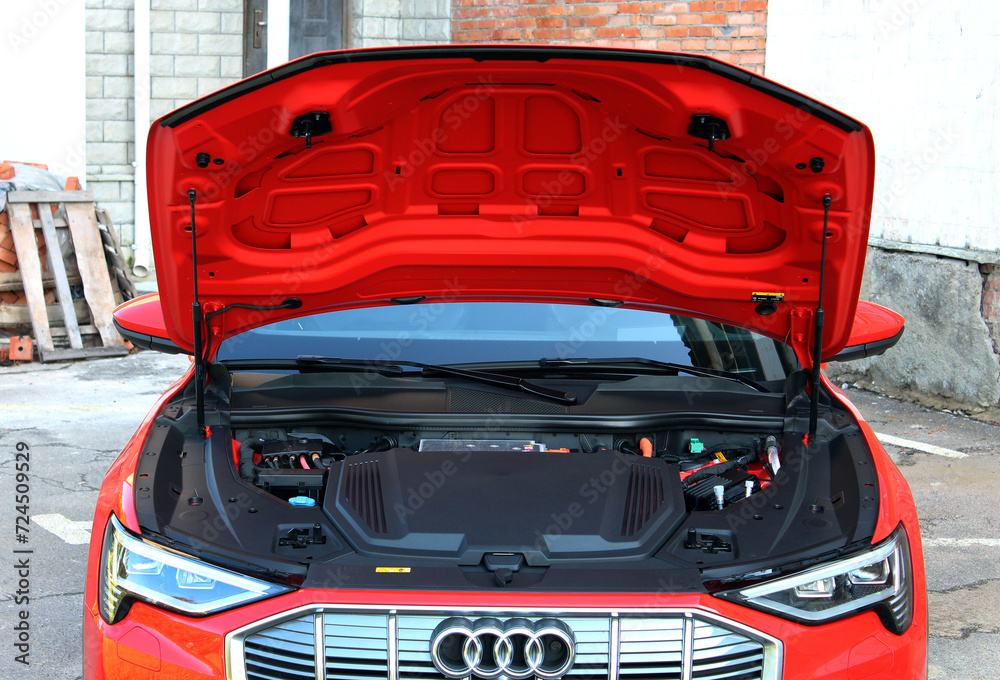 Vinnytsia, Ukraine; September 20, 2023. Red Audi E-Tron car open hood ...