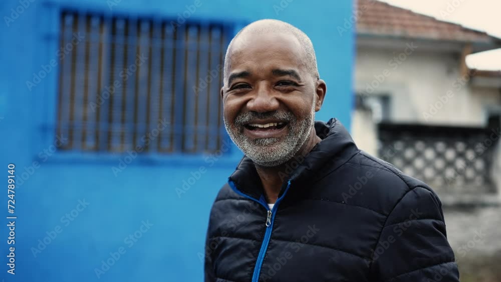 Happy Middle-Aged Black Man Walking Forward in Urban Environment ...
