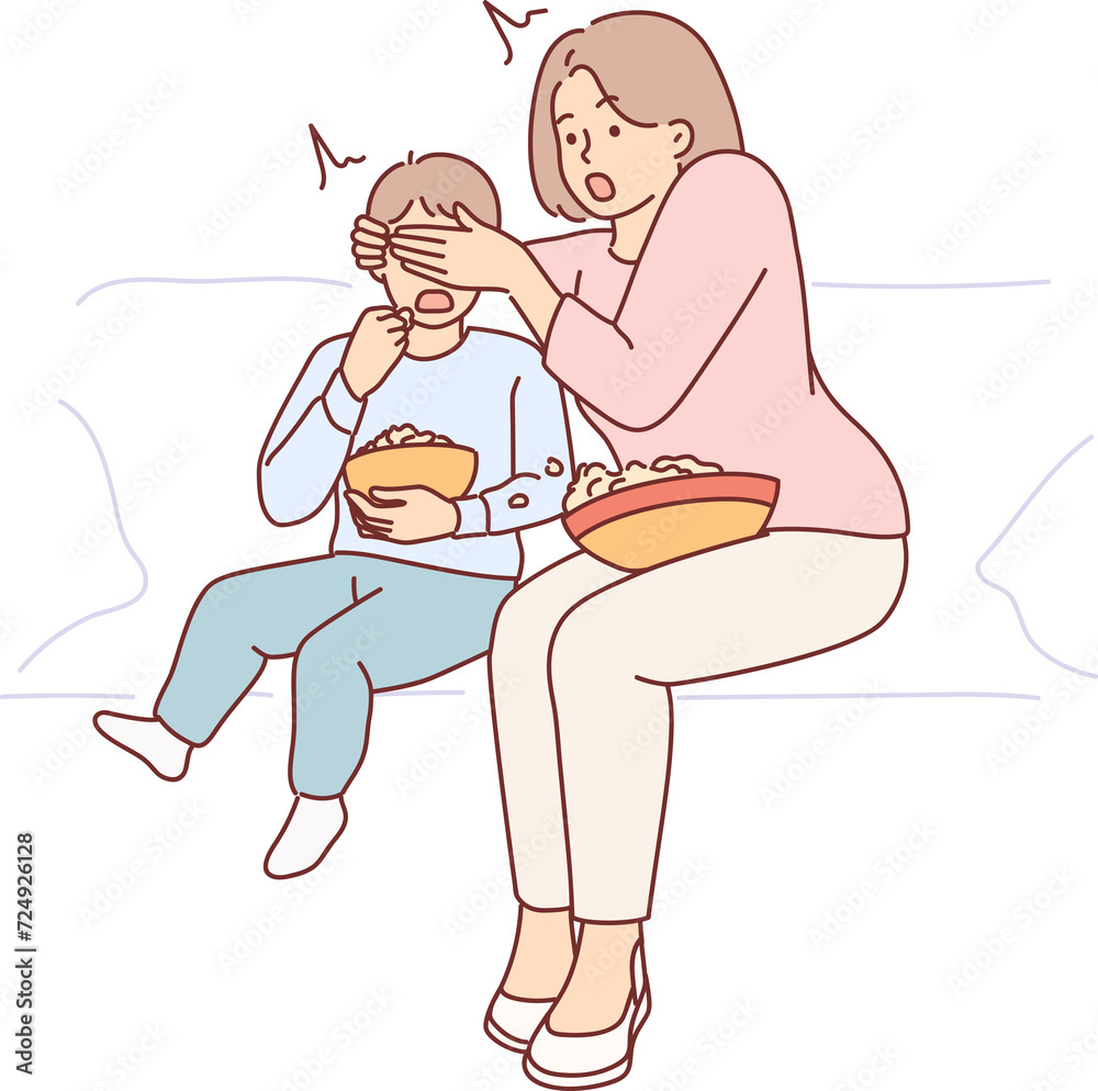 Shocked mother closes son eyes while watching television show with ...