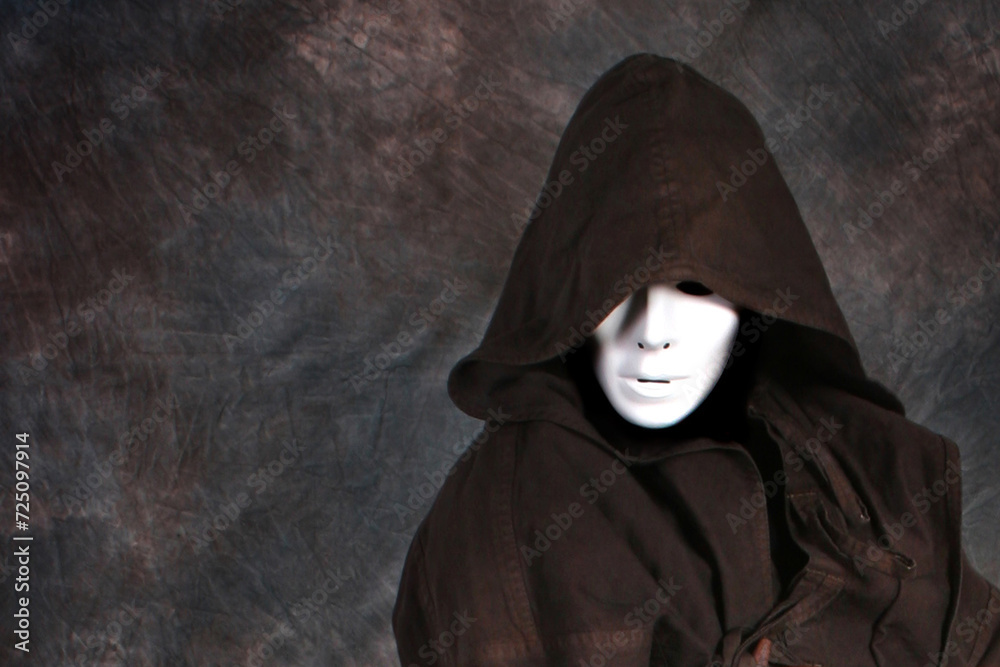 Horizontal close-up photo of a faceless person (demon, monster) wearing ...