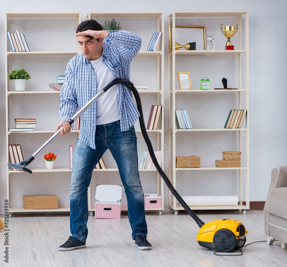 Man doing cleaning at home Stock Photo | Adobe Stock