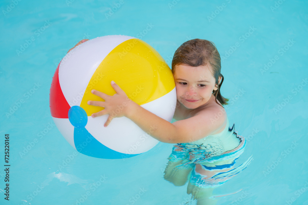 Kids playing at swimming pool. Summer family vacation. Water toys for ...