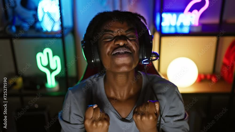 Triumphant joy floods young black woman with dreadlocks, confidently ...