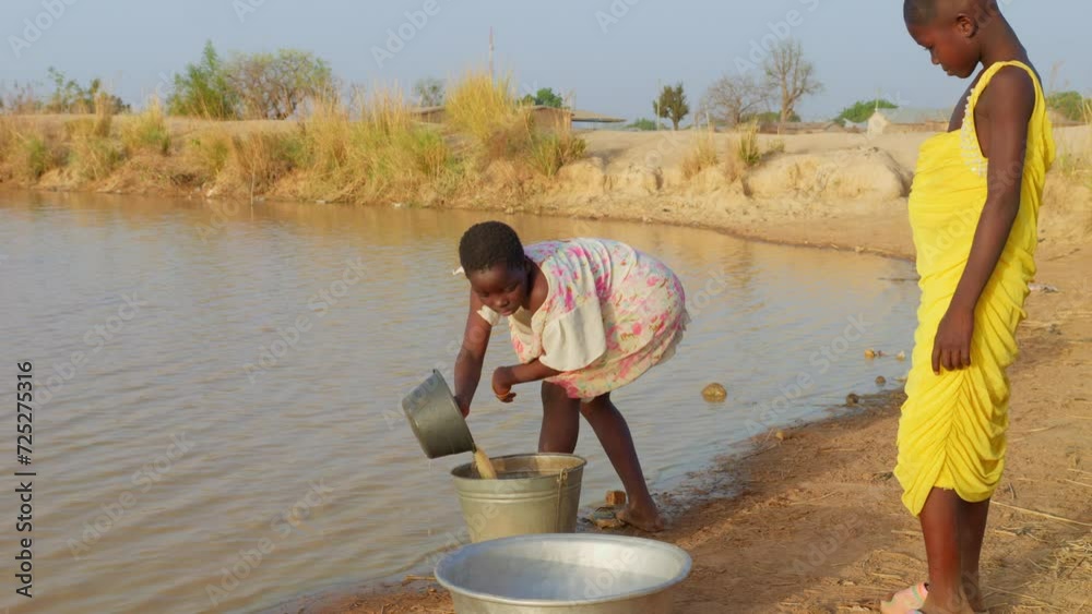 drinkable water purified in Africa , kid child children filling water ...