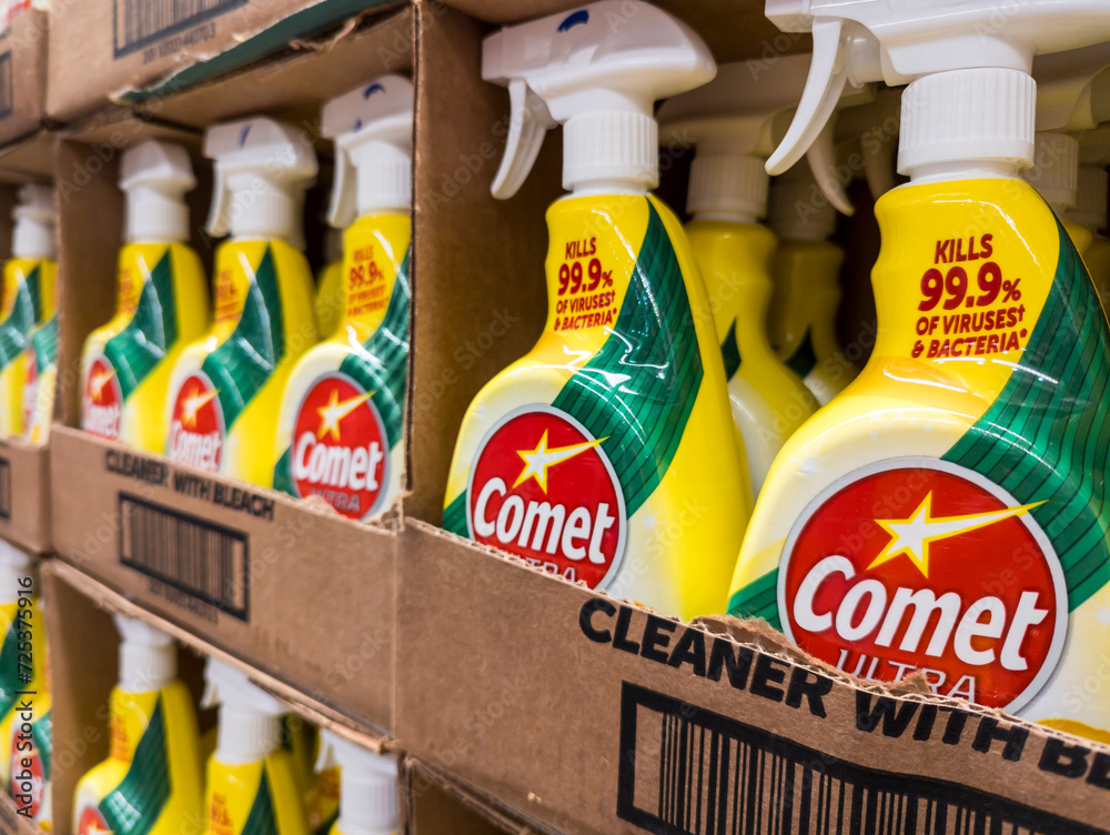 Rows of Comet Ultra disinfectant cleaner bottles with bleach on a store ...