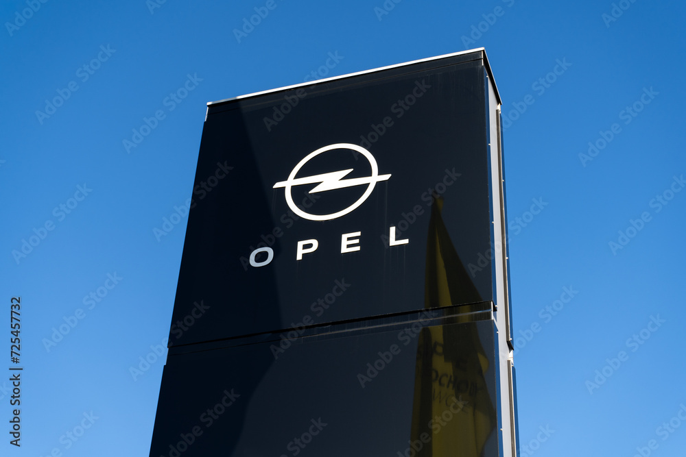 Opel Automobile GmbH logo sign outside car dealership building. German ...