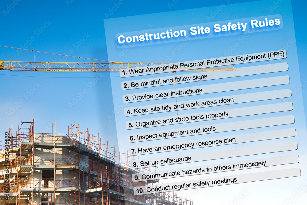 Construction site safety rules concept with buildings and tower crane - Building safely on ...