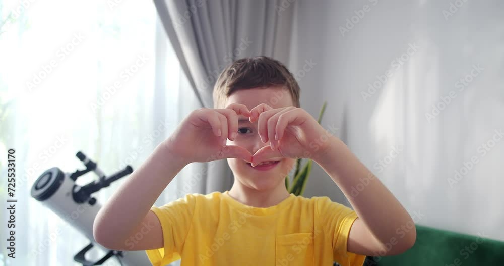 Beautiful happy little cute child face adorable boy kid seen through ...
