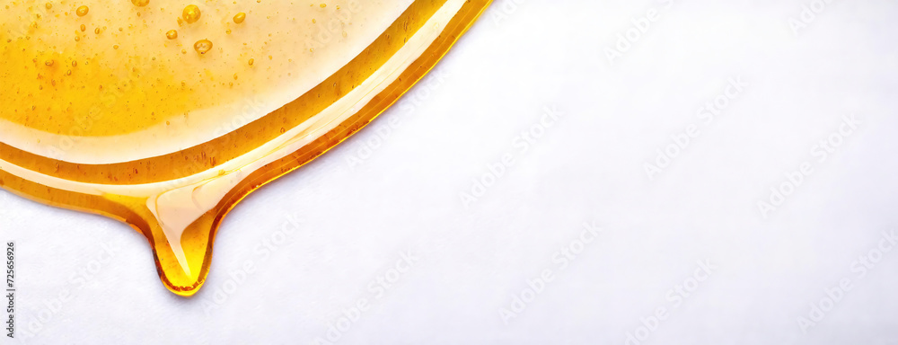 Golden honey with droplet suspended, high detail. A high-resolution ...