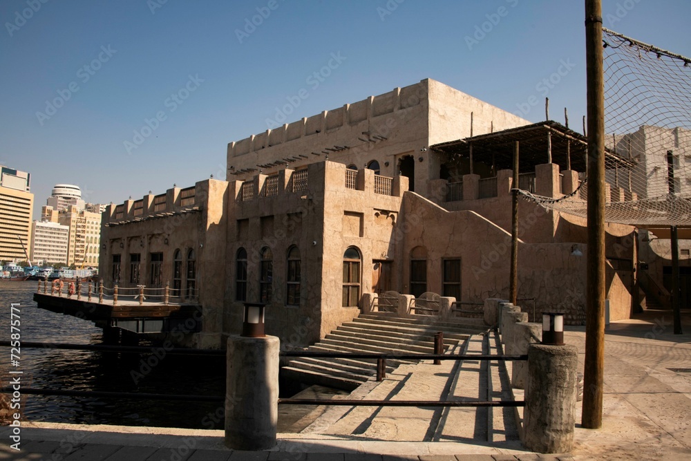 restored old building in the historic district in Dubai at the water ...