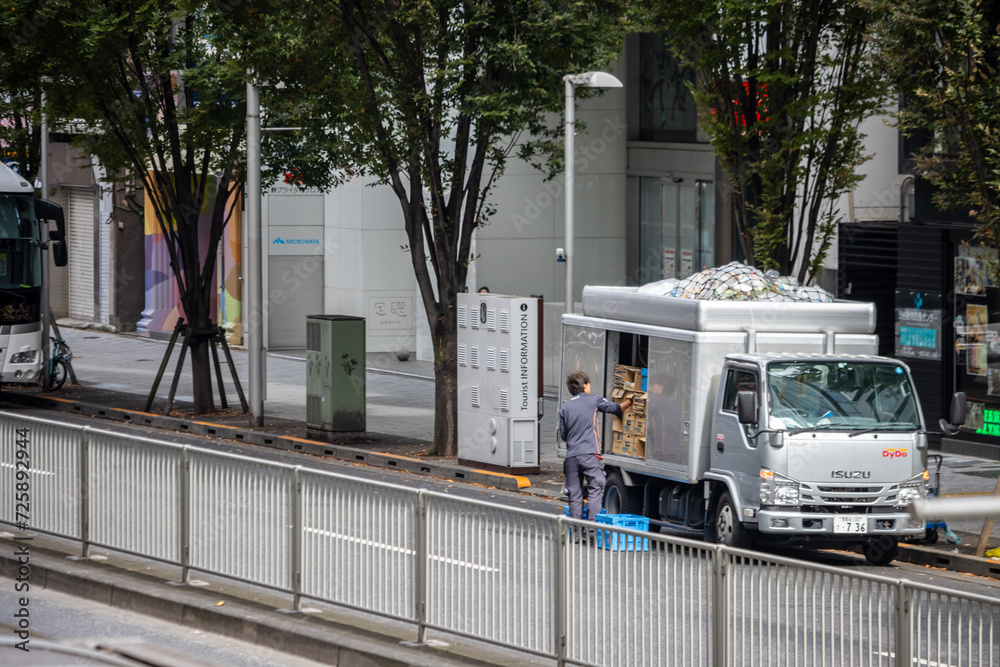 Tokyo, Japan, 29 October 2023 : Urban recycling efforts with workers ...