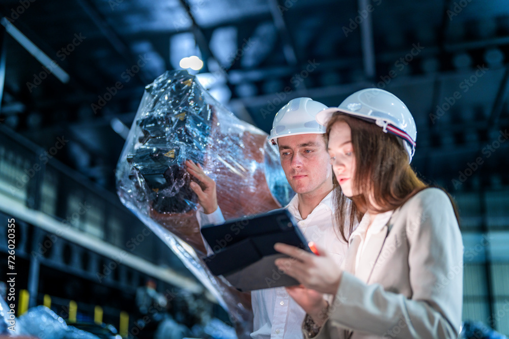 Sales manager and factory owner in suits negotiating selling robots ...