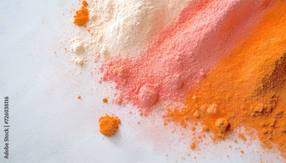 closeup image of orange and pink colorant powder texture on white paper ...