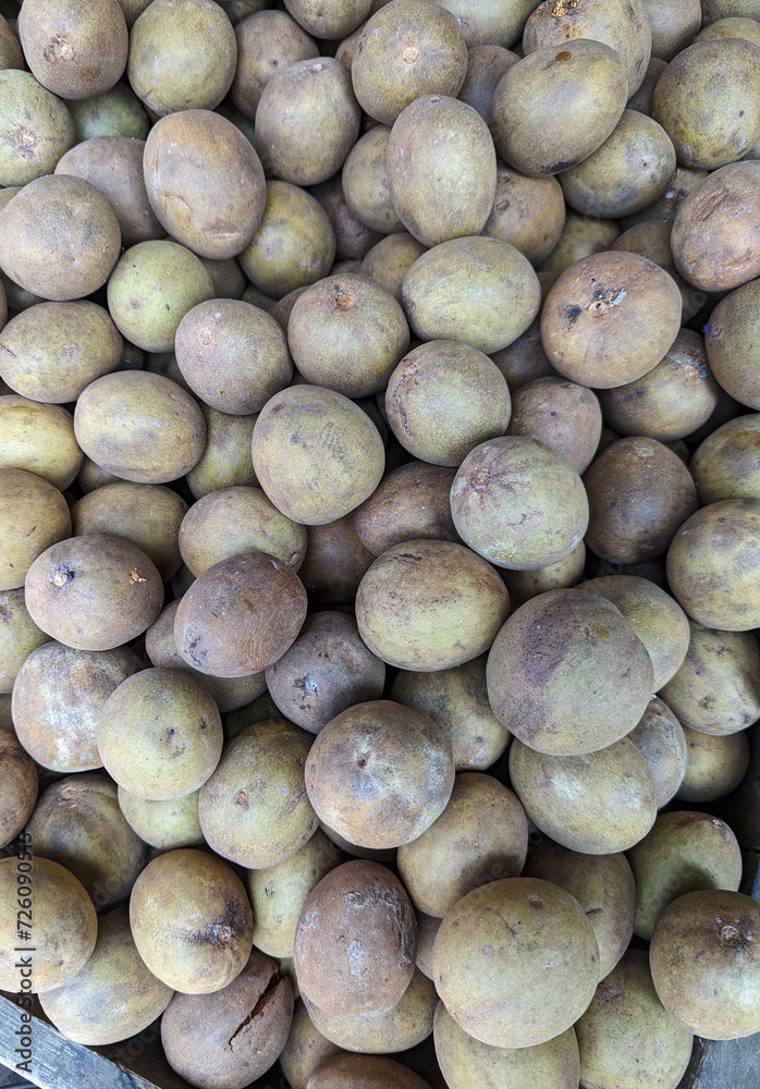 fruit basket containing ripe sapodilla fruit, a tropical fruit. Stock ...