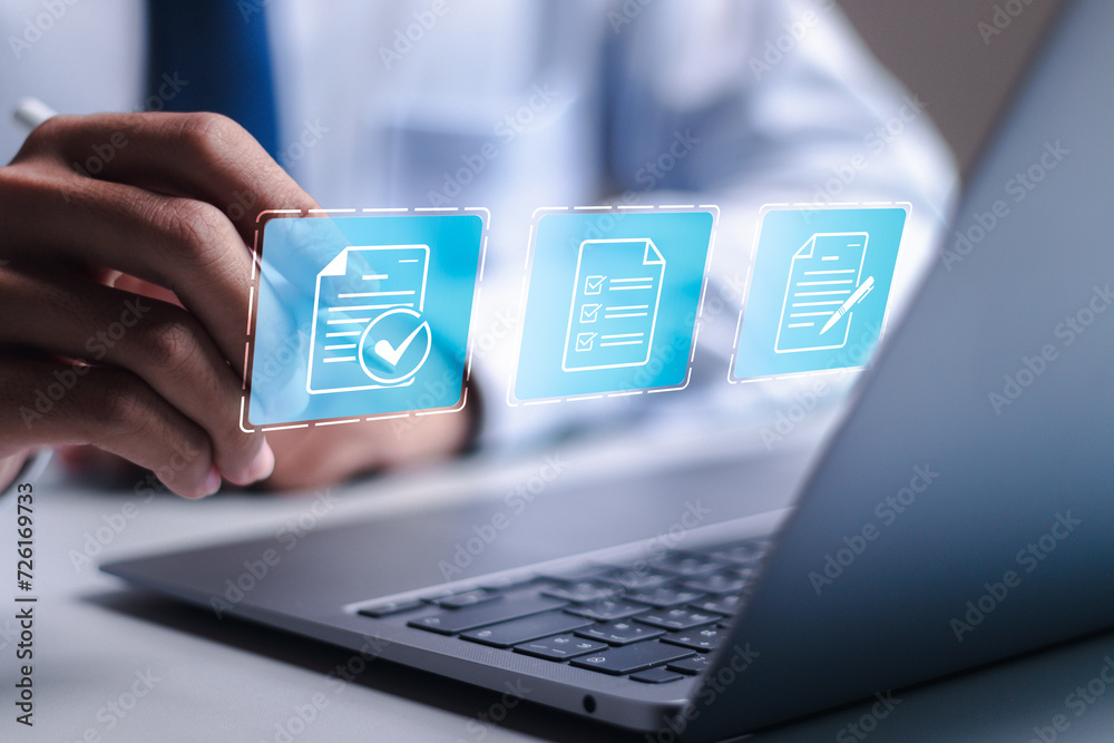 Document management concept, Businessman use laptop to paperless online ...