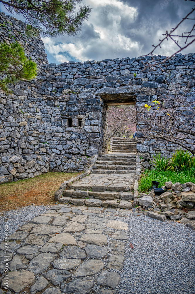 The Nakijin Castle Ruins are located on the Motobu Peninsula of ...