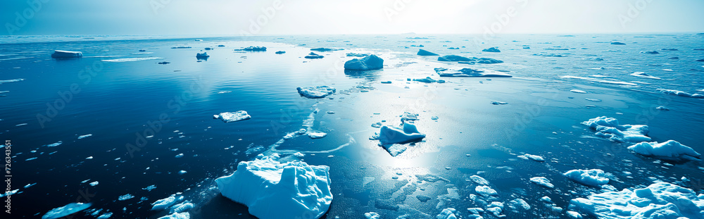 Sunrise over melting polar ice caps and ocean ice, highlighting climate ...