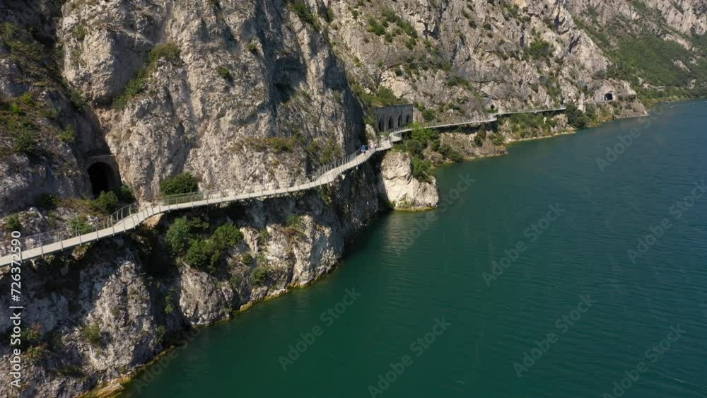 Garda bike path. Garda bicycle and pedestrian path suspended above the ...