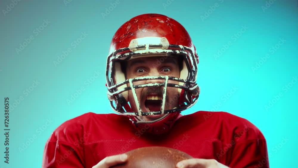 Video Stock Putting energy into game. Emotional American football ...