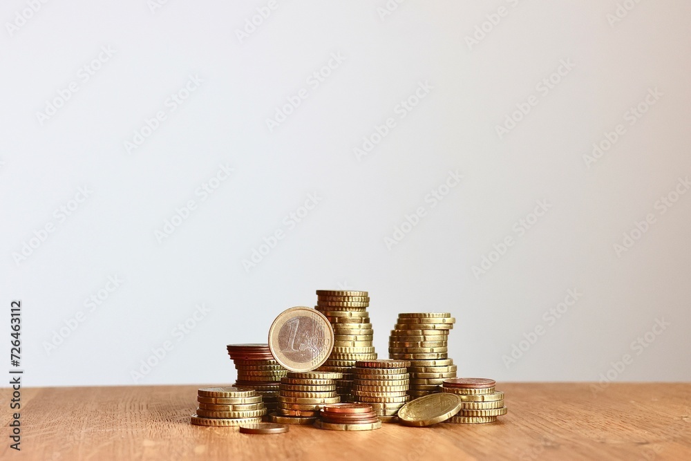 pile of money, stack of money, stacked euro coins on white background ...
