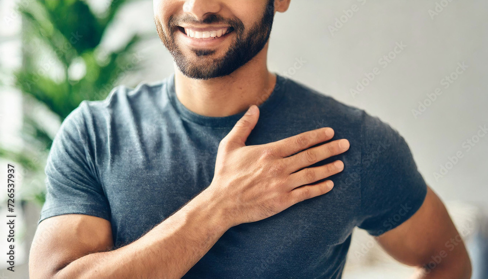 hand over chest, depicting heart attack pain, against a clean ...