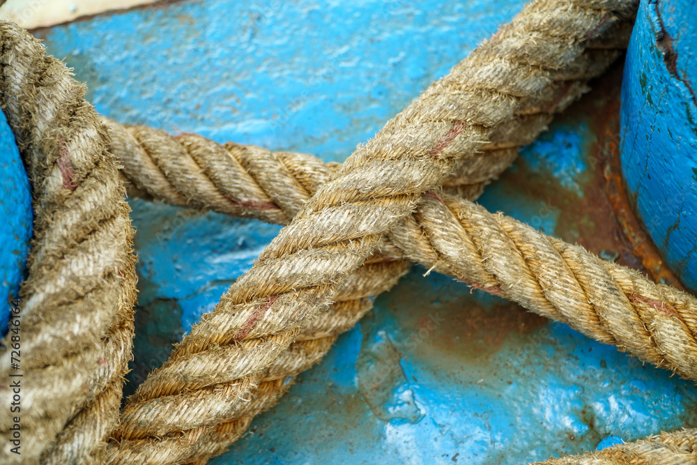 Rope anchored the boat into the harbor.Mooring rope and bollard Stock ...