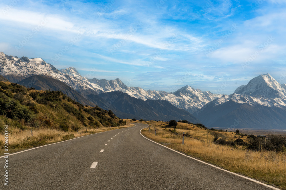Mount Cook road heading to the snow capped alps in the Aoraki Mt Cook ...