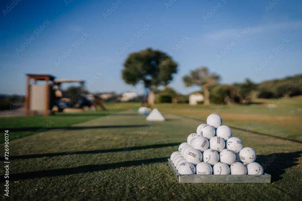 Sotogrante, Spain - January 27, 2024 - A pyramid of golf balls in focus ...