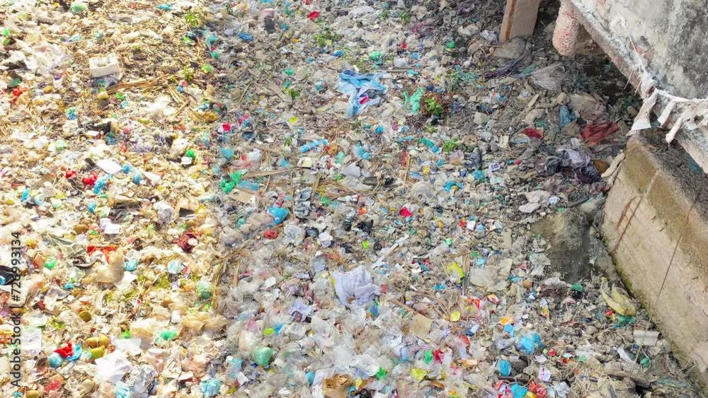 A ditch overflowing with trash garbage. Environment pollution Stock ...