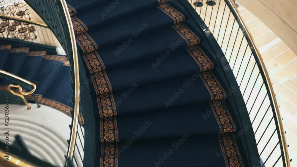 Elegant spiral staircases in luxury hotel, stairway decorated with ...