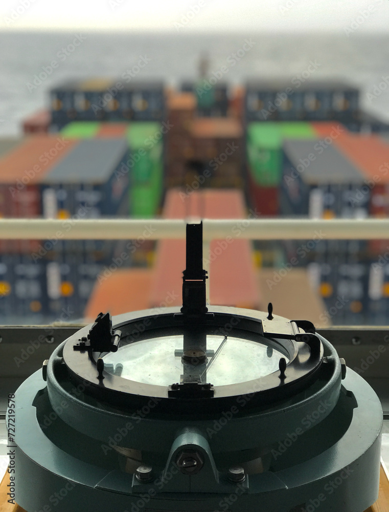 Closeup view of compass with azimuth circle fitted in the bridge of a ...
