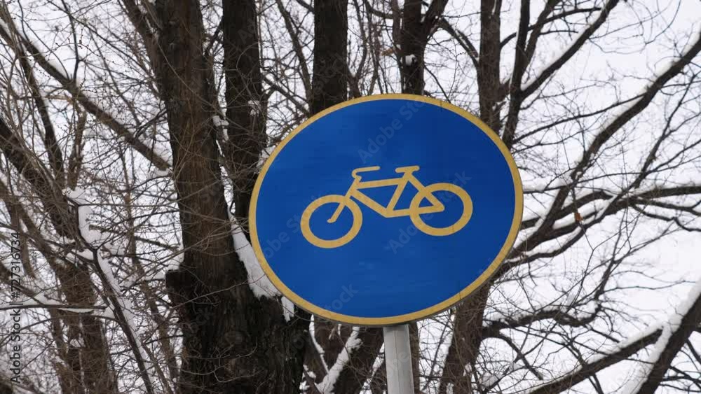 Bicycle path road sign. Road sign installed in the park. Round blue ...