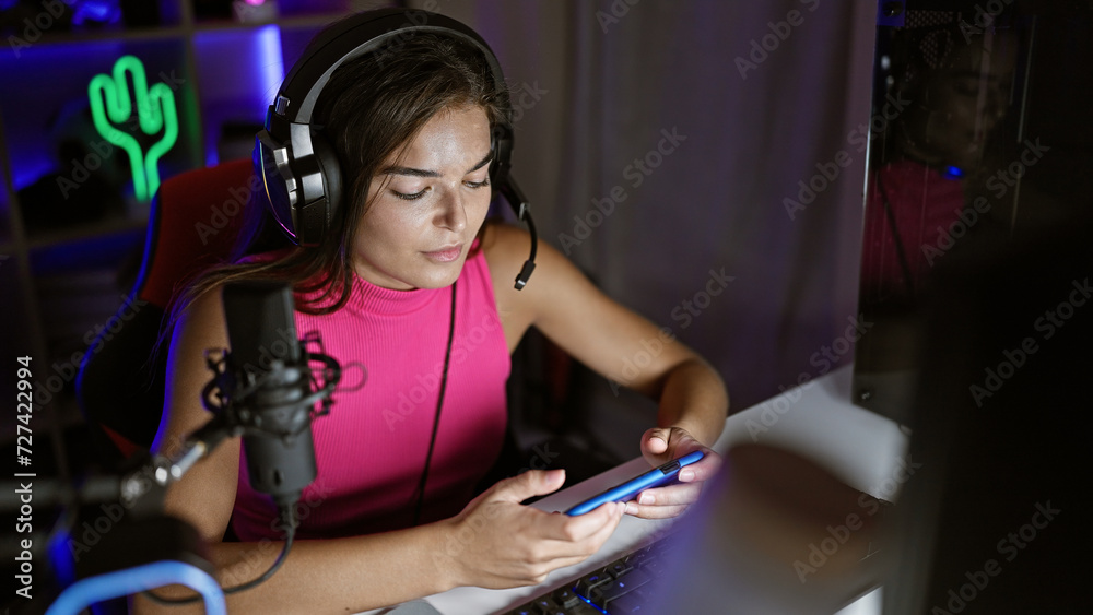 Hispanic streamer chick, stunning young woman engrossed in her gaming ...