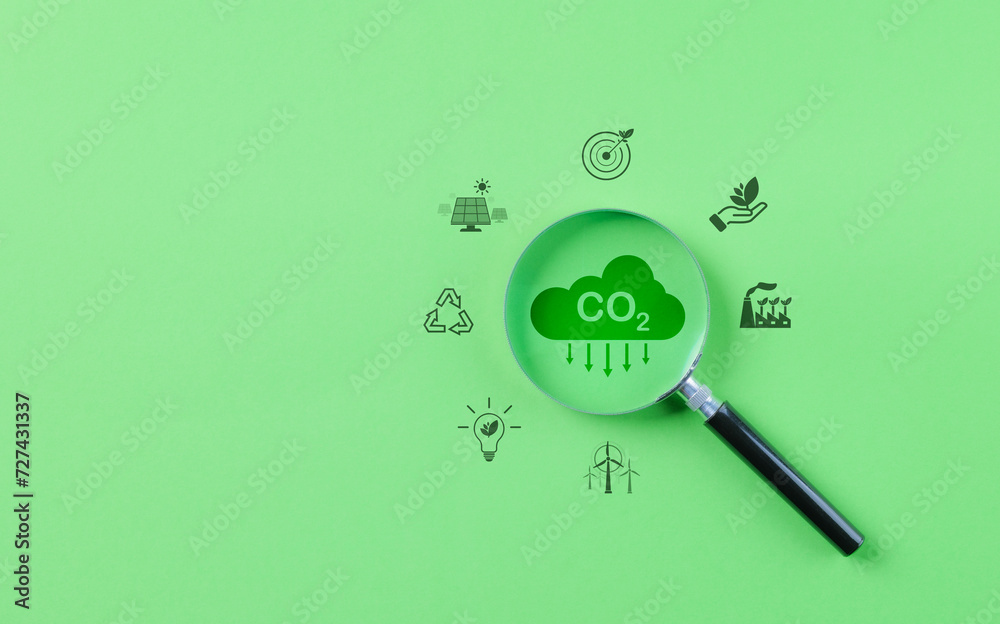 Magnifying glass with reduce CO2 emission concept, Environment icons decrease CO2, Reduction ...