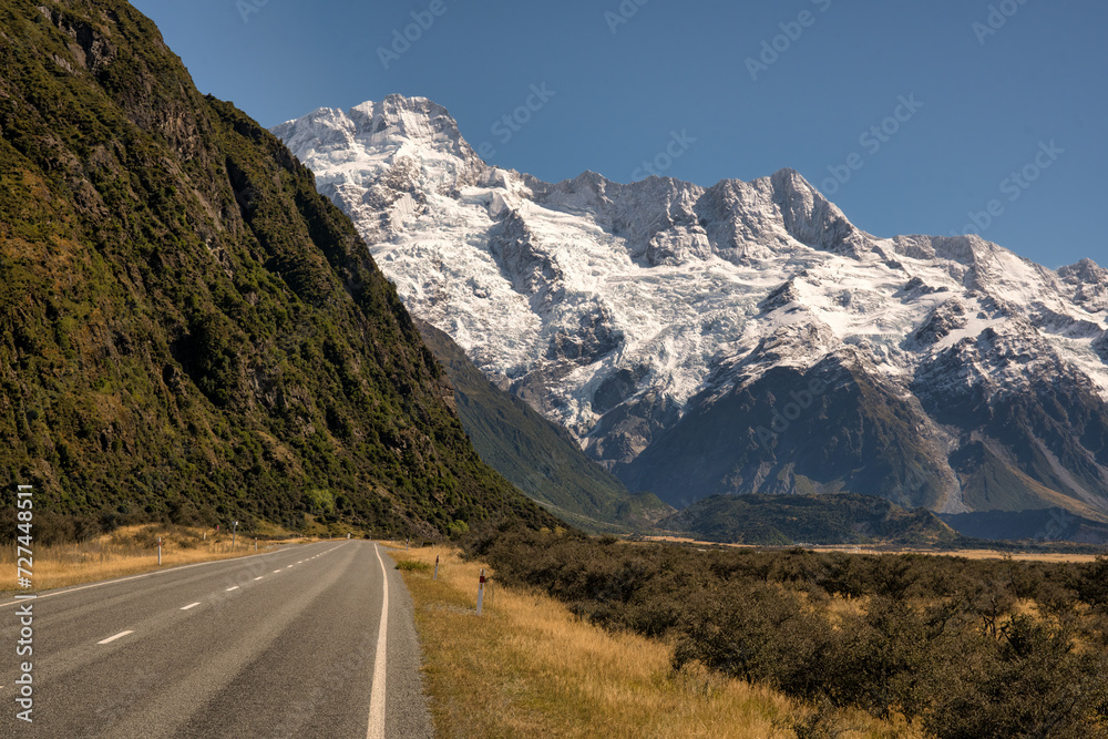 Mount Cook road heading to the snow capped alps in the Aoraki Mt Cook ...