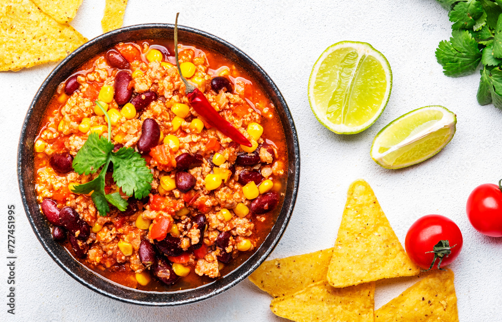 Chili con carne, mexican dish with minced beef, red beans, paprika ...