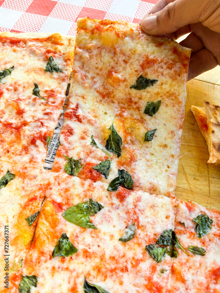 Close up view of pizza margherita italian traditional healthy carbo food nutrition at the ...