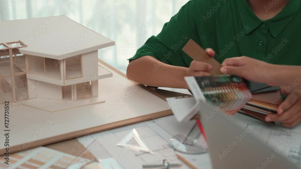 Vidéo Stock Slow motion home designer using architectural equipment ...