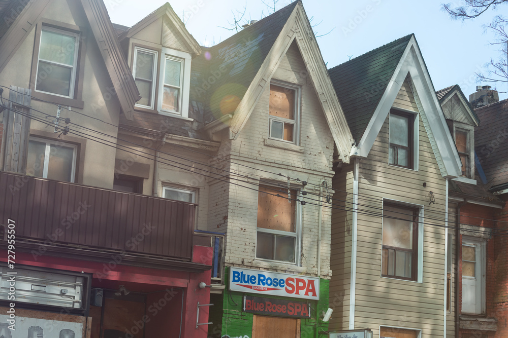 old houses (former businesses) located on the south west corner of Bay ...