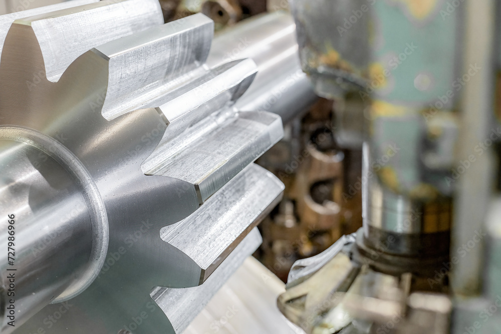 Manufacturing and cutting of a gear shaft tooth on an oil-cooled gear ...