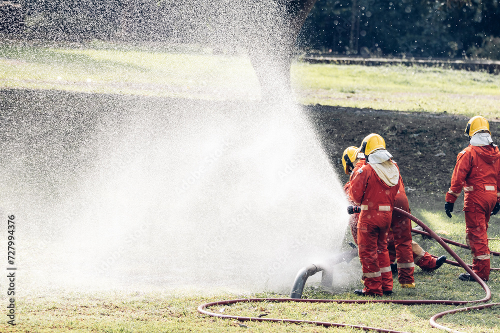 Firefighter Concept. Several firefighters go offensive for a fire ...